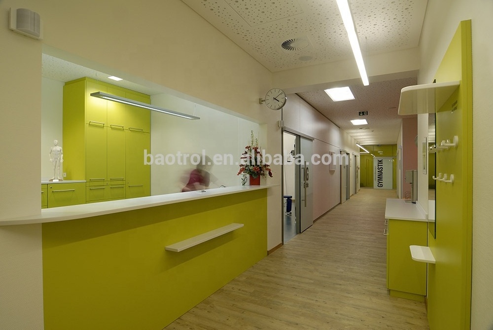 White and green solid surface hospital clinic front desk reception desk ...
