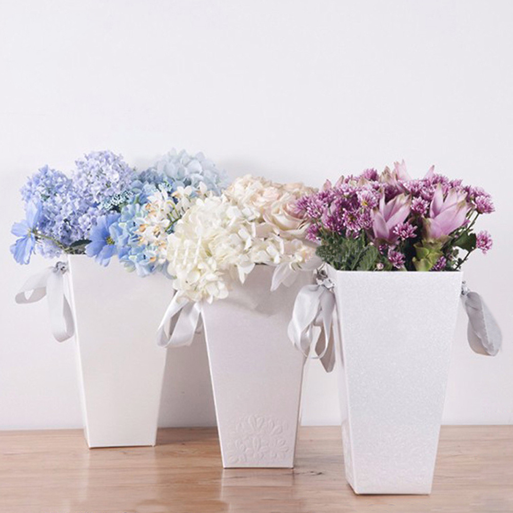 Cardboard single flower box with red black white yellow color ...