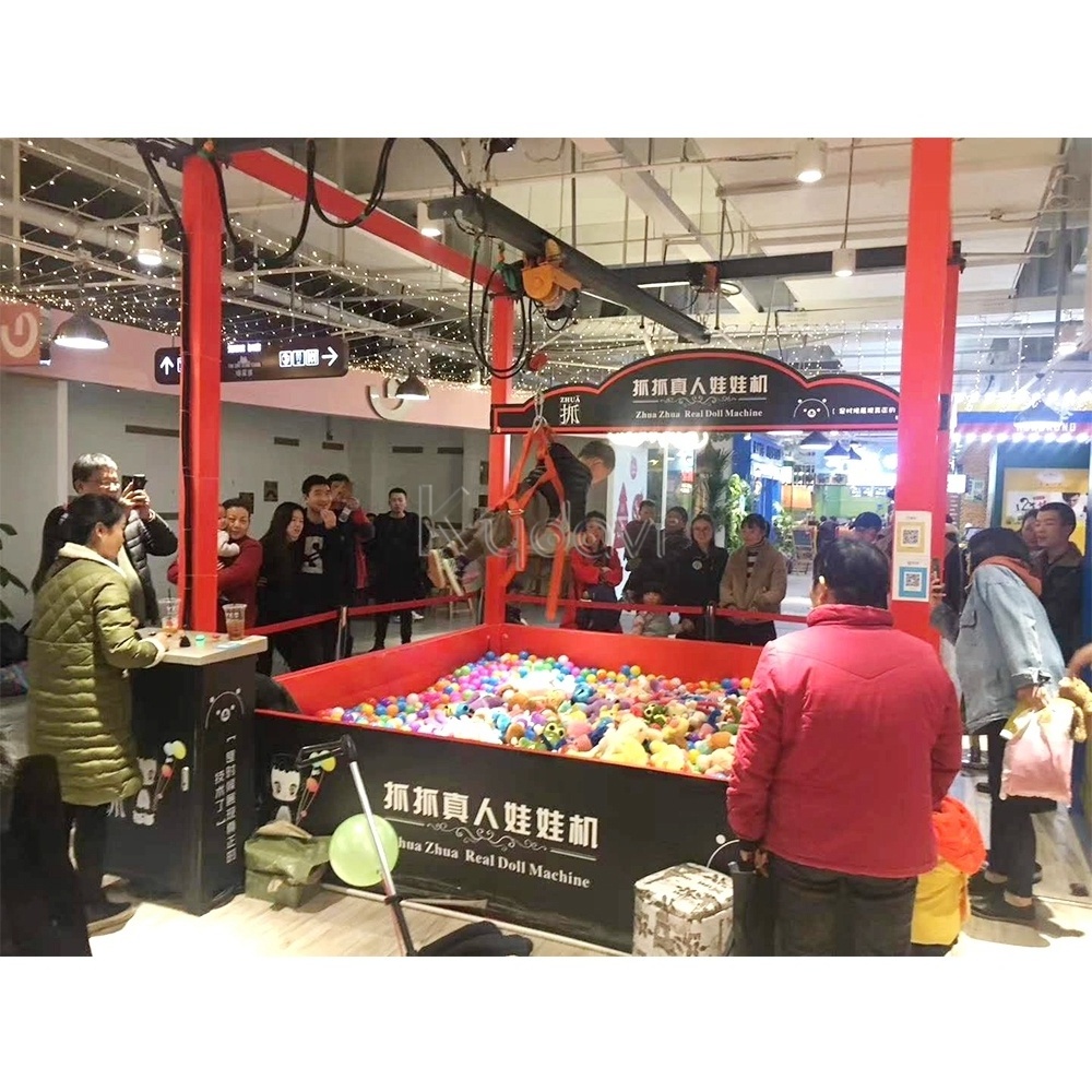Super large crane doll fun happy vending coin operated real human claw ...